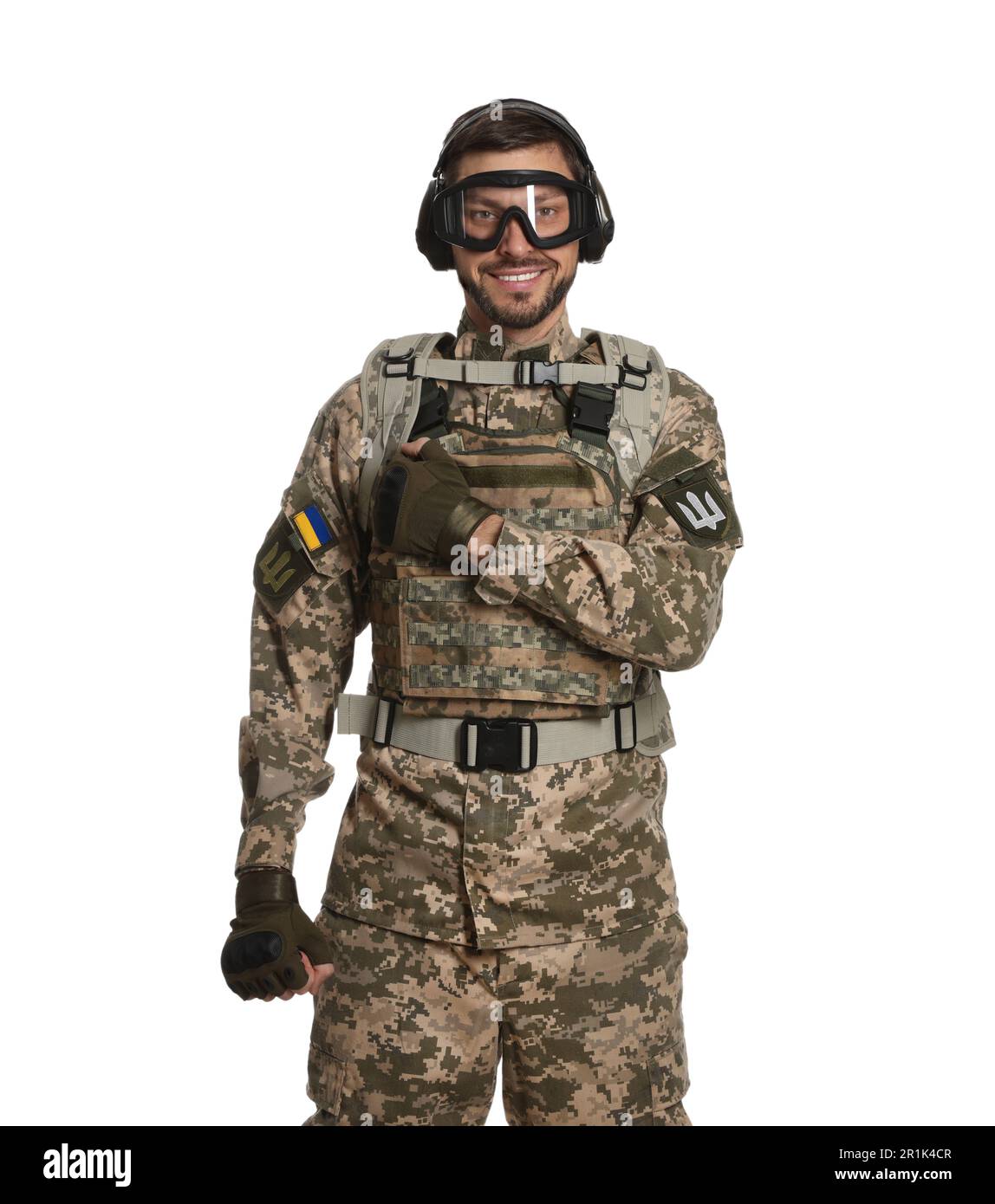 Soldier in Ukrainian military uniform, tactical goggles and headphones ...