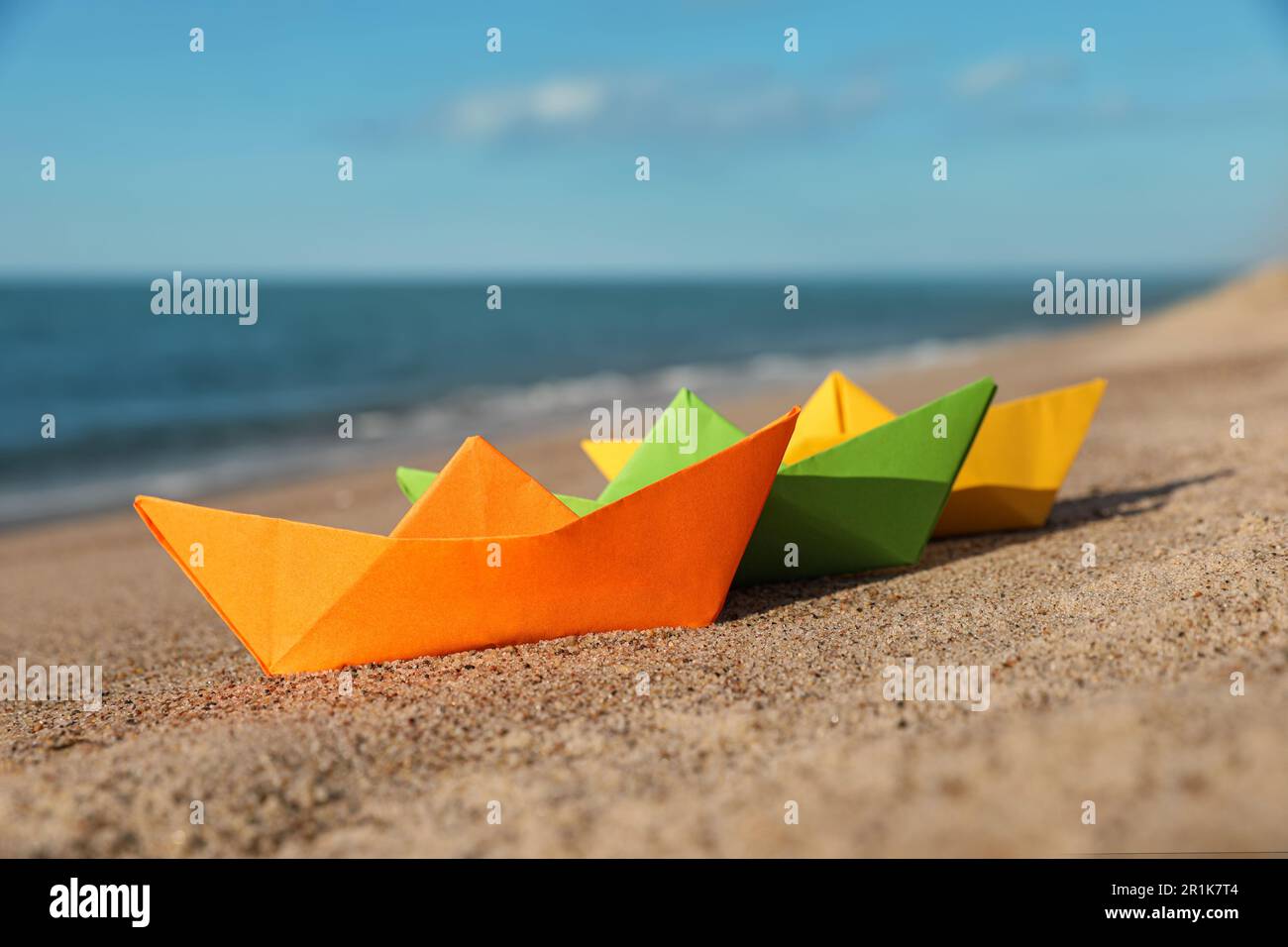 Light green paper boats hi-res stock photography and images - Alamy