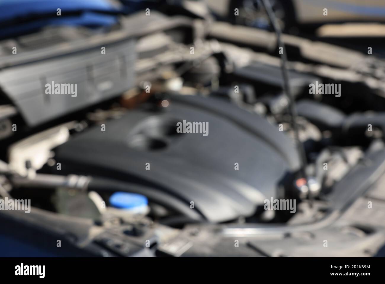 Blurred view of car engine in modern auto Stock Photo - Alamy
