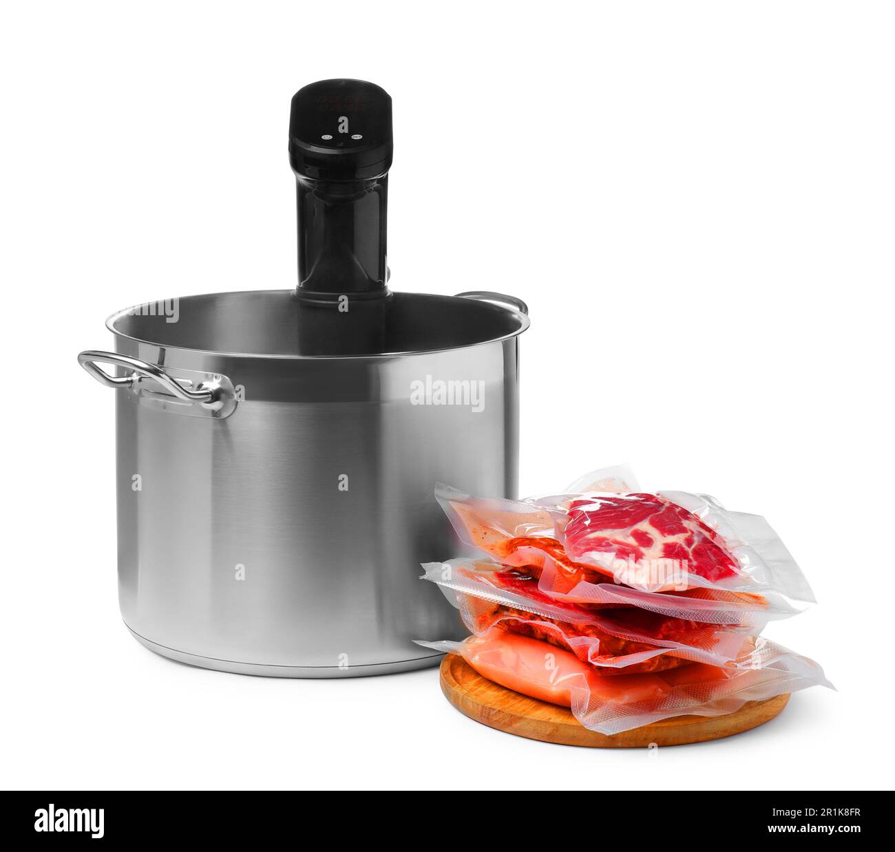 Thermal immersion circulator in pot and meat on white background ...