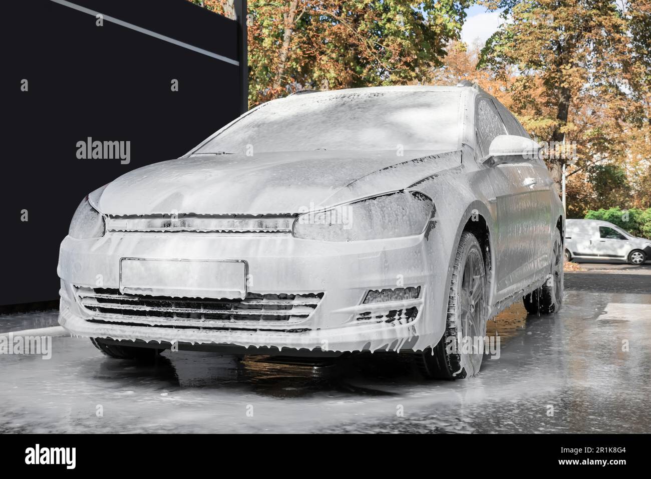 Auto with cleaning foam at outdoor car wash Stock Photo - Alamy