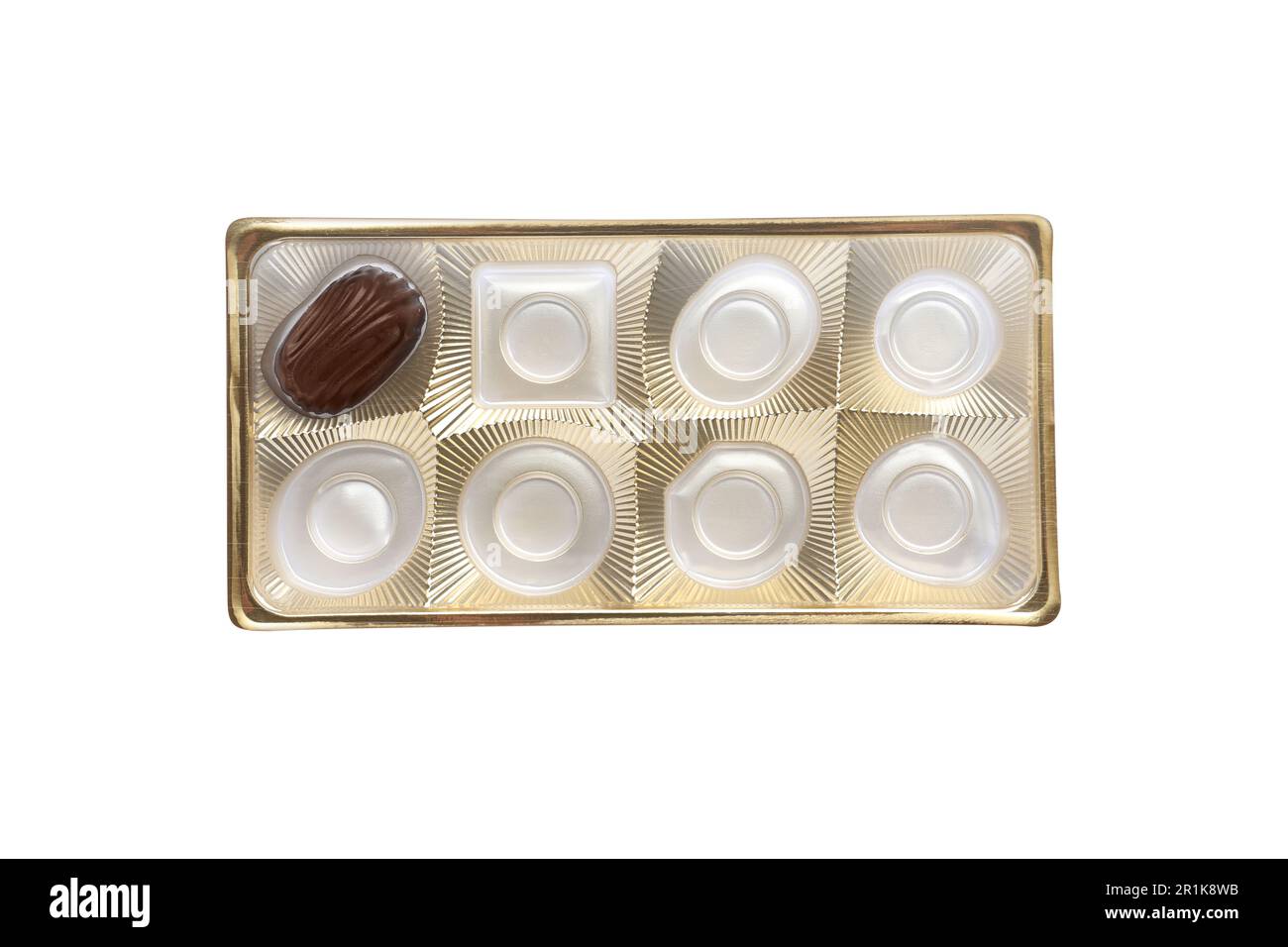 Partially empty box of chocolate candies isolated on white, top view ...