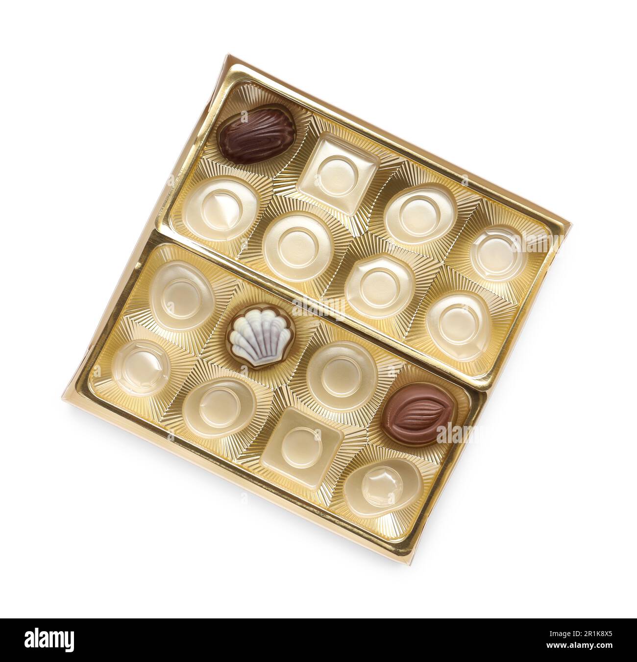 Partially empty box of chocolate candies isolated on white, top view ...