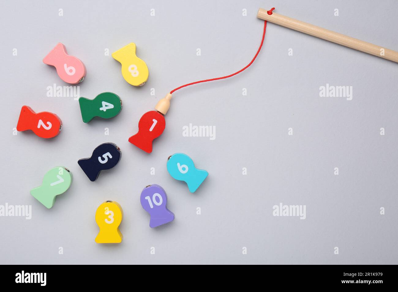 Educational game Fishing for Numbers on light grey background, flat lay ...