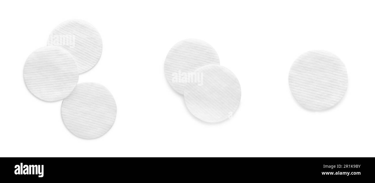 Set with soft clean cotton pads on white background, top view. Banner ...