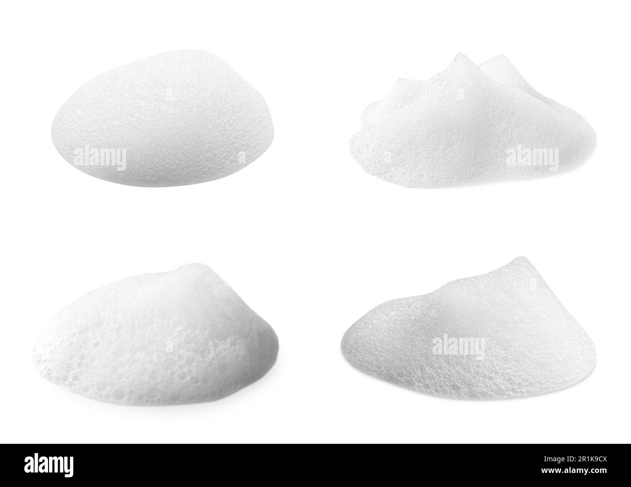 Set with drops of fluffy soap foam on white background Stock Photo - Alamy