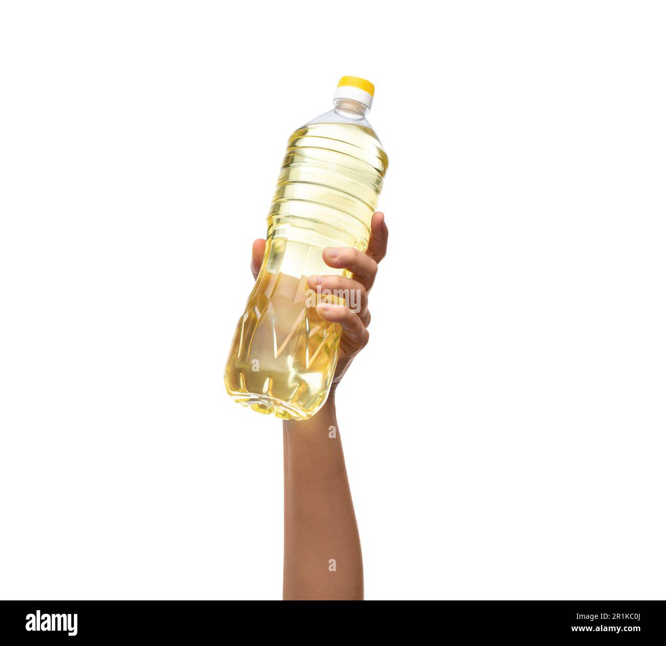 hand holding cooking oil in plastic bottle Stock Photo - Alamy