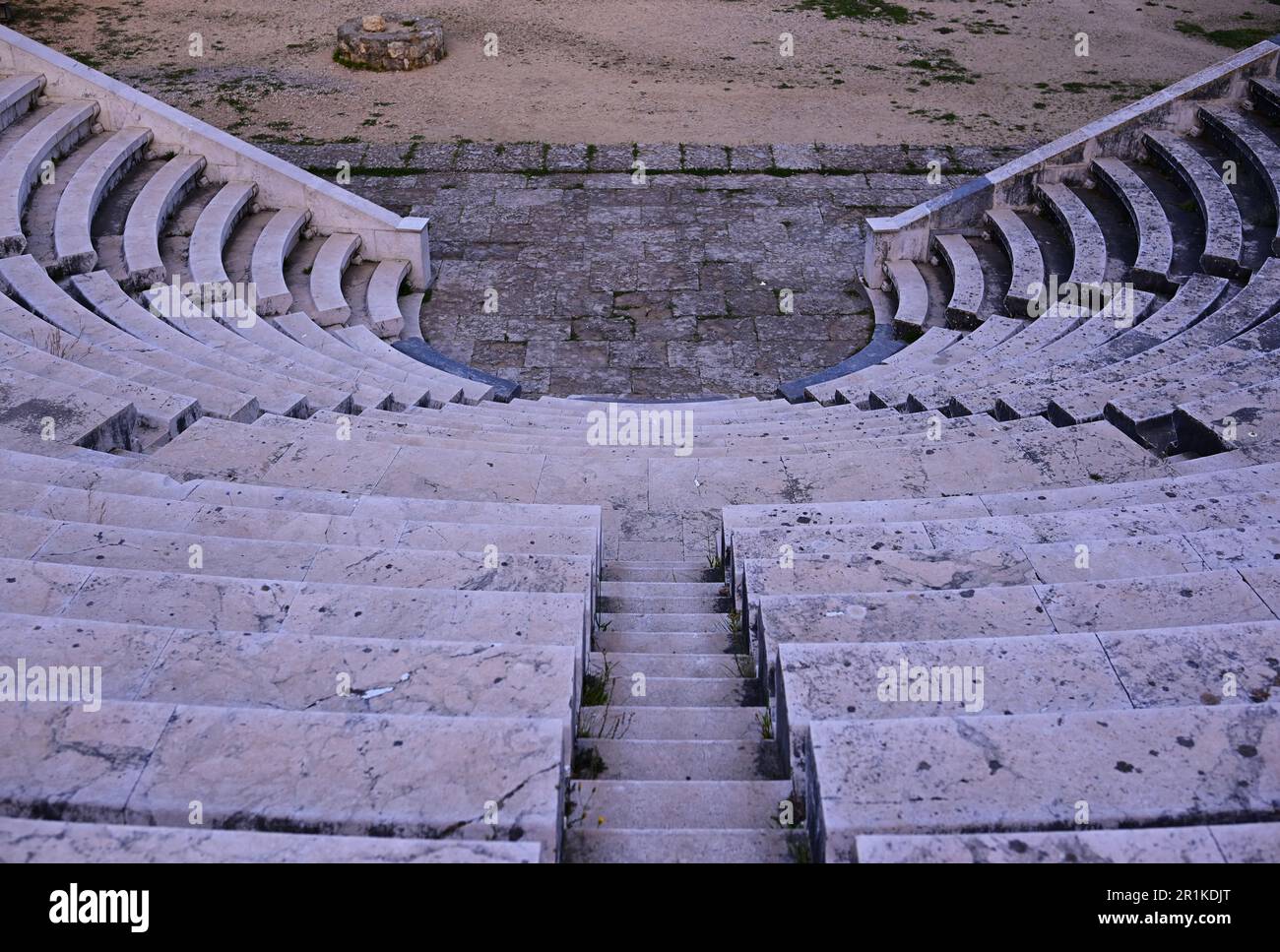 Ancient Greek theater-odeon with stone rows and steps between the rows ...