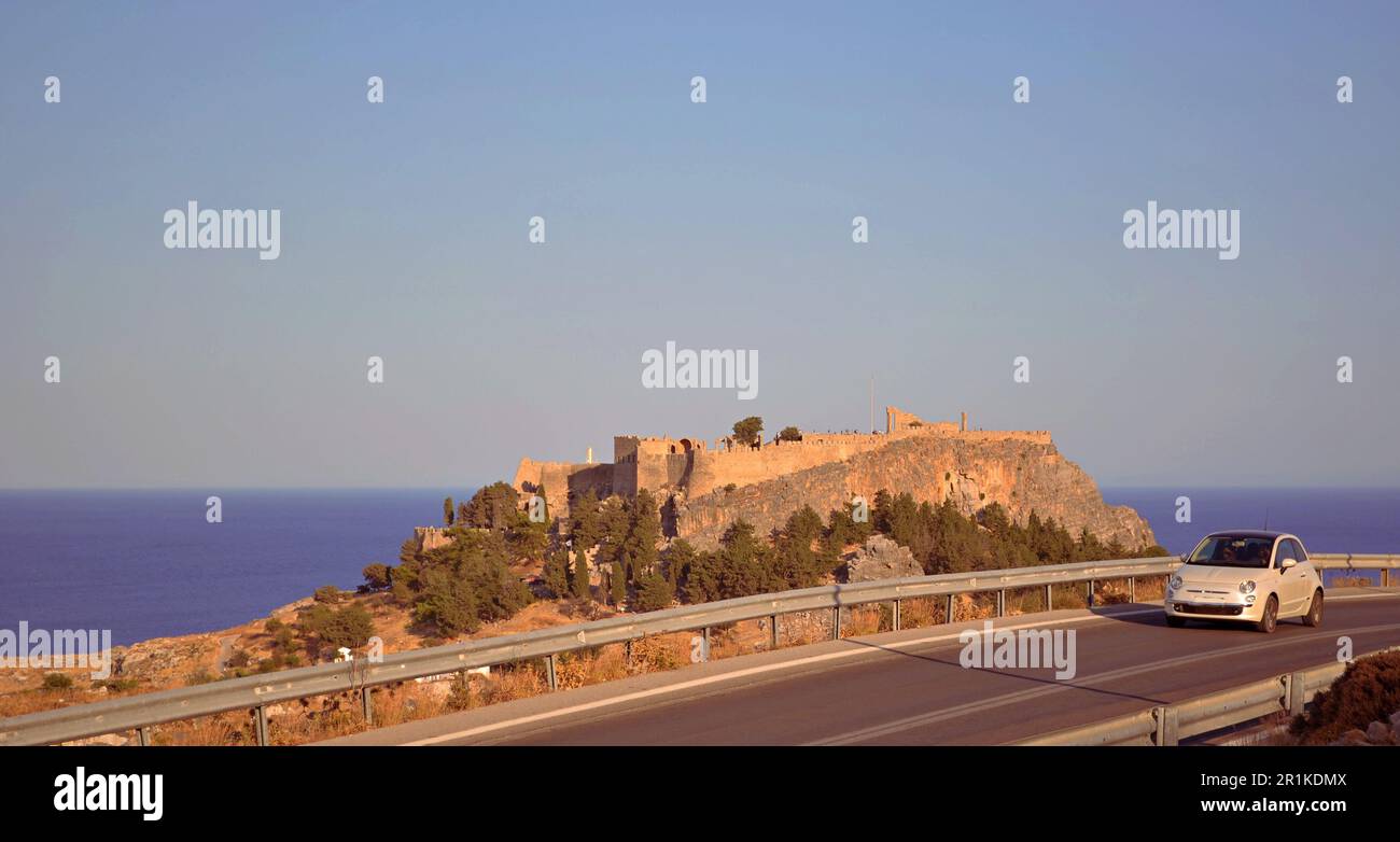 The ancient Acropolis of the goddess Athena in the village of Lindos on ...