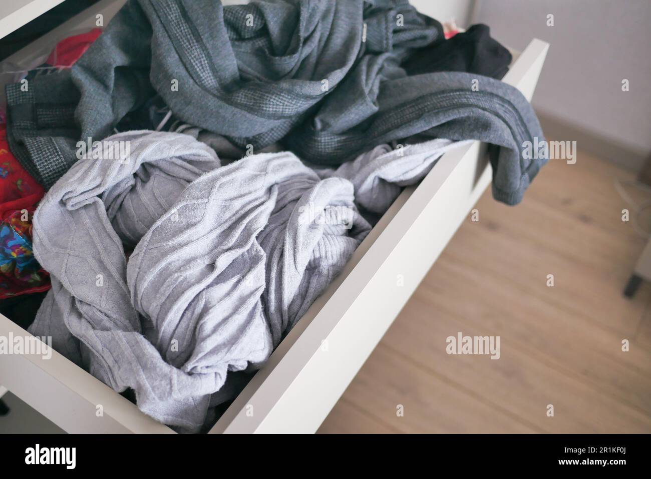 rawer with messy cloths top view Stock Photo - Alamy