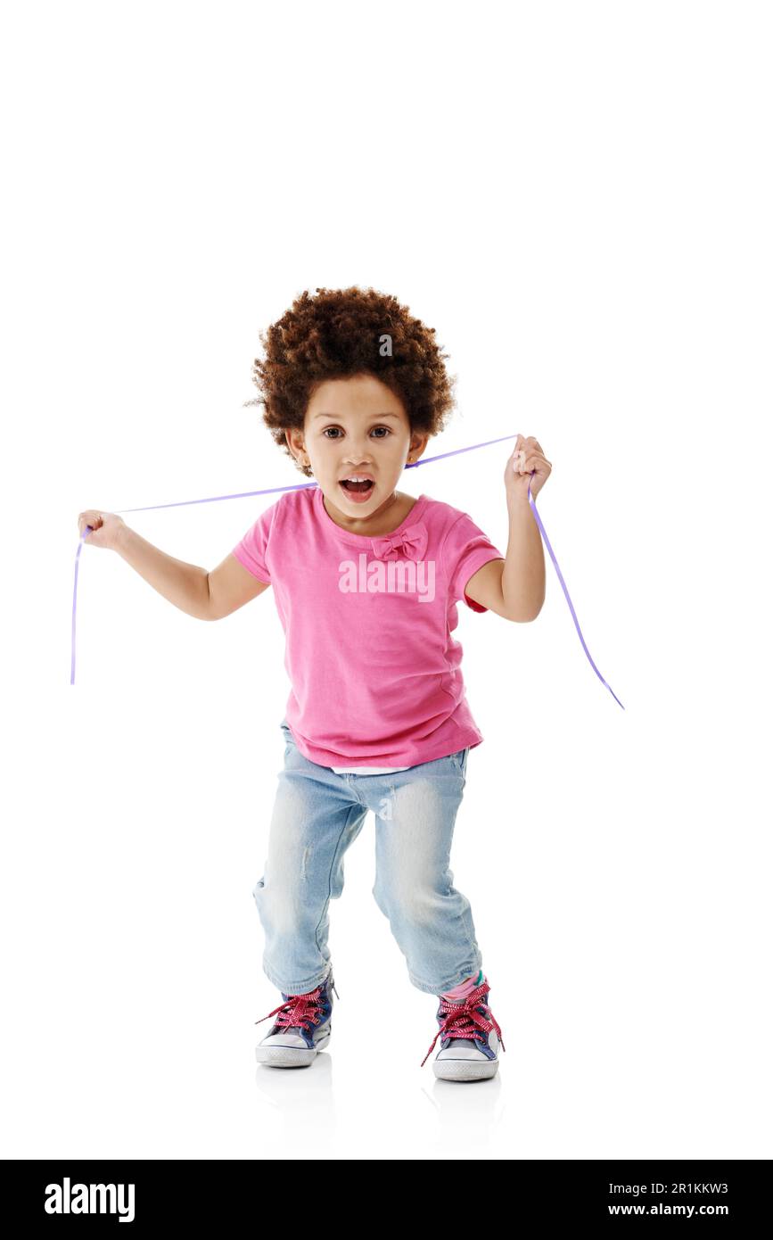 Some days are simply meant for playing. Studio shot of a cute little ...