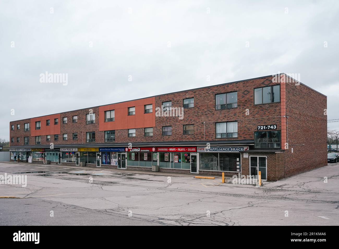 A typical strip mall, strip center, strip centre, or strip plaza, is a ...