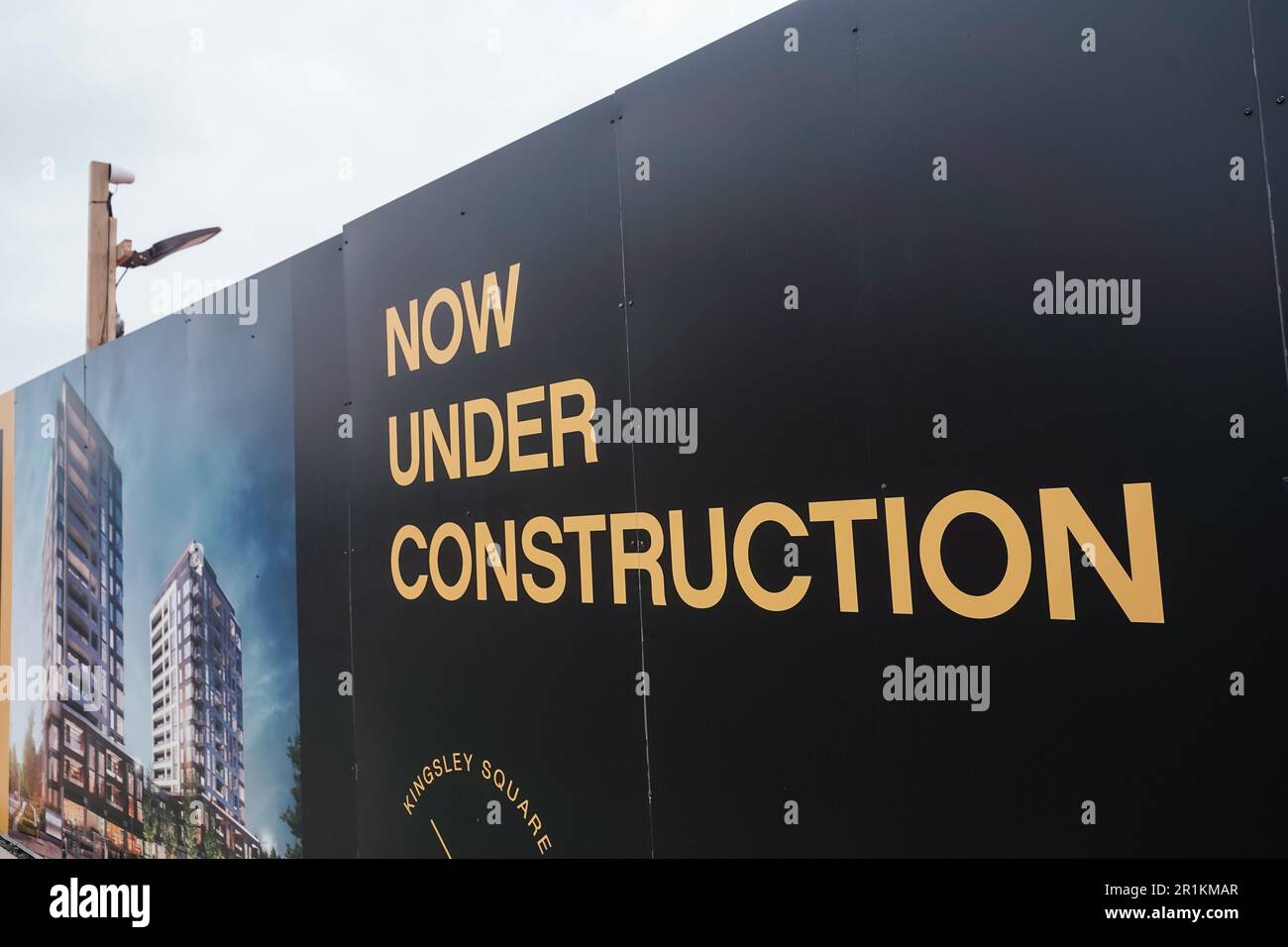 under construction sign of a condo building Stock Photo - Alamy