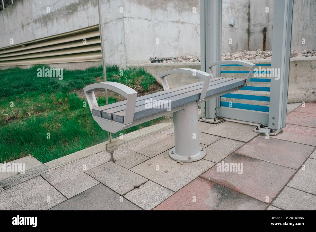 A sitting bench inside a bus shelter Stock Photo - Alamy