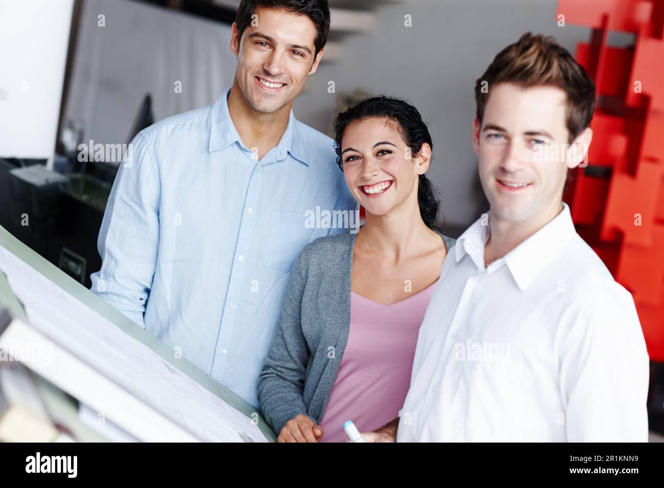 Team of successful architects. Portrait of three talented architects ...