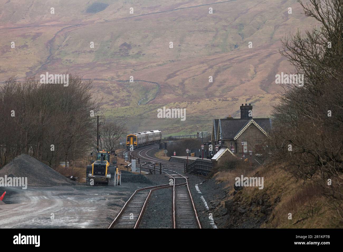 Northern Rail class 158 sprinter train departing from Ribblehead ...