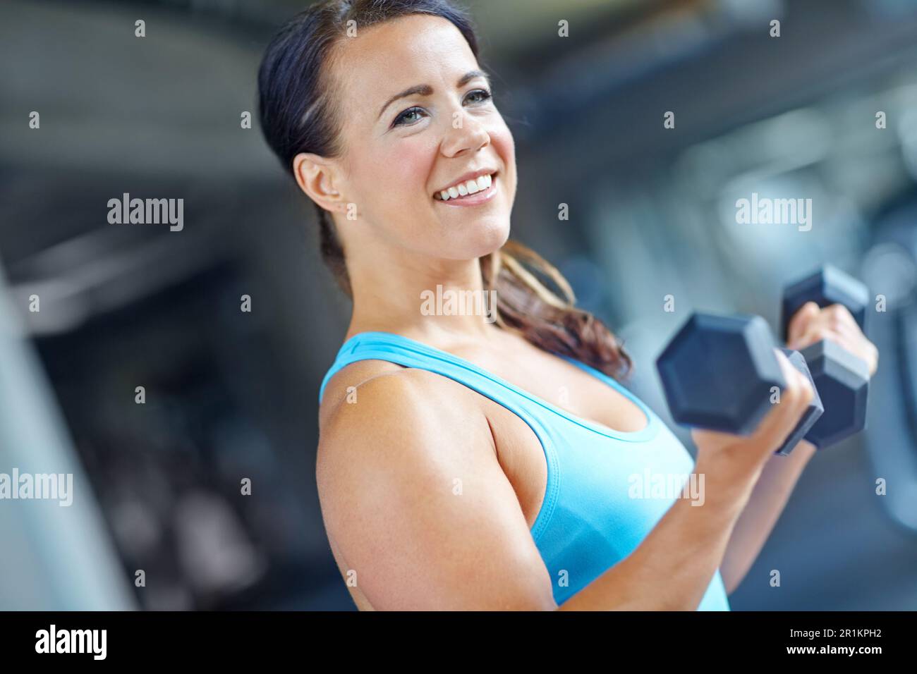 Im making great progress. A beautiful young woman working out at the ...
