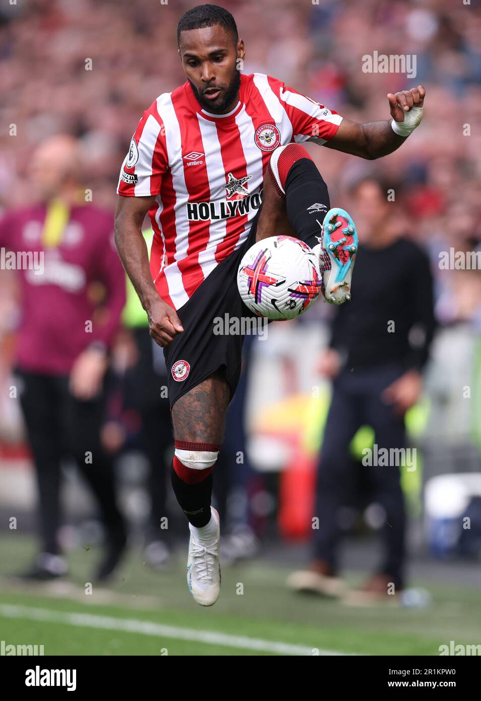London, UK. 14th May, 2023. Rico Henry of Brentford during the Premier ...