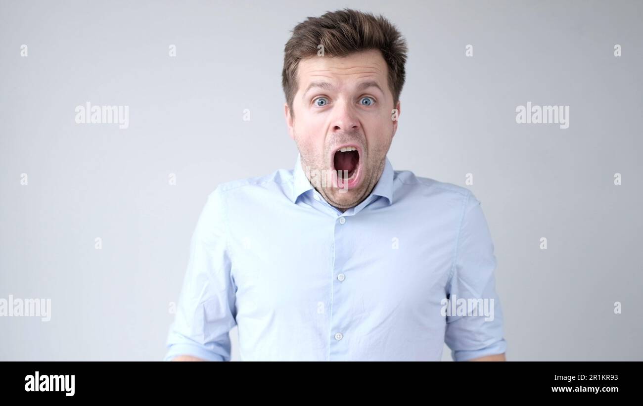 Surprised amazed young european man hi-res stock photography and images ...