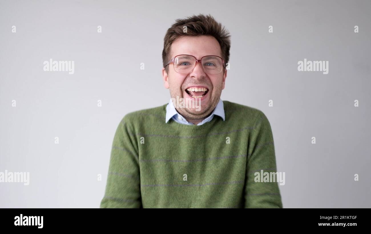 European funny young man is laughing loudly. Positive emotion Stock ...