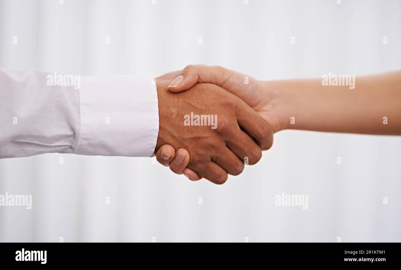 Theyve come to an agreement. two hands joining for a hand shake Stock ...