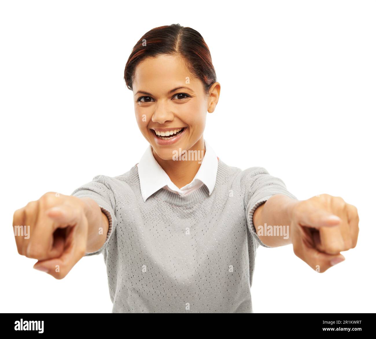 You got it. Studio portrait of an attractive young woman pointing at ...