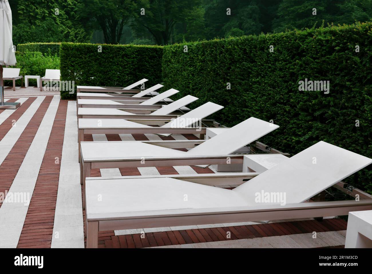 Empty wooden sunbeds rest hi-res stock photography and images - Alamy
