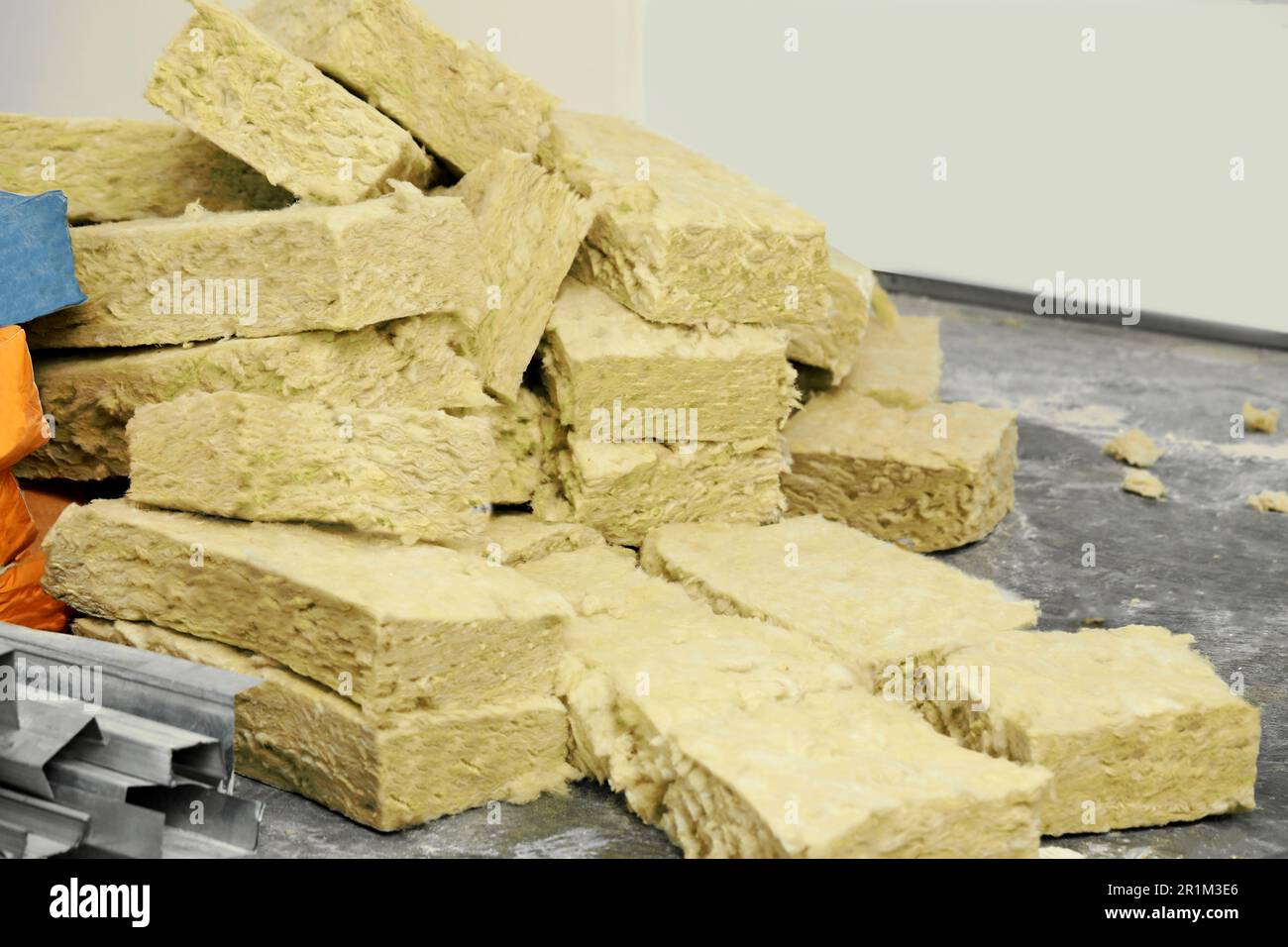 Heap of thermal insulation material in room Stock Photo - Alamy