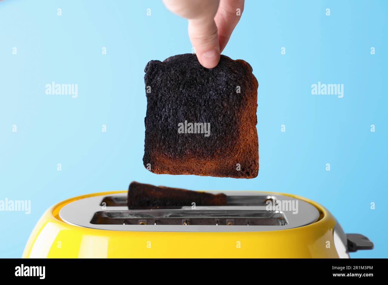 Woman taking hot homemade bread hi-res stock photography and images - Alamy