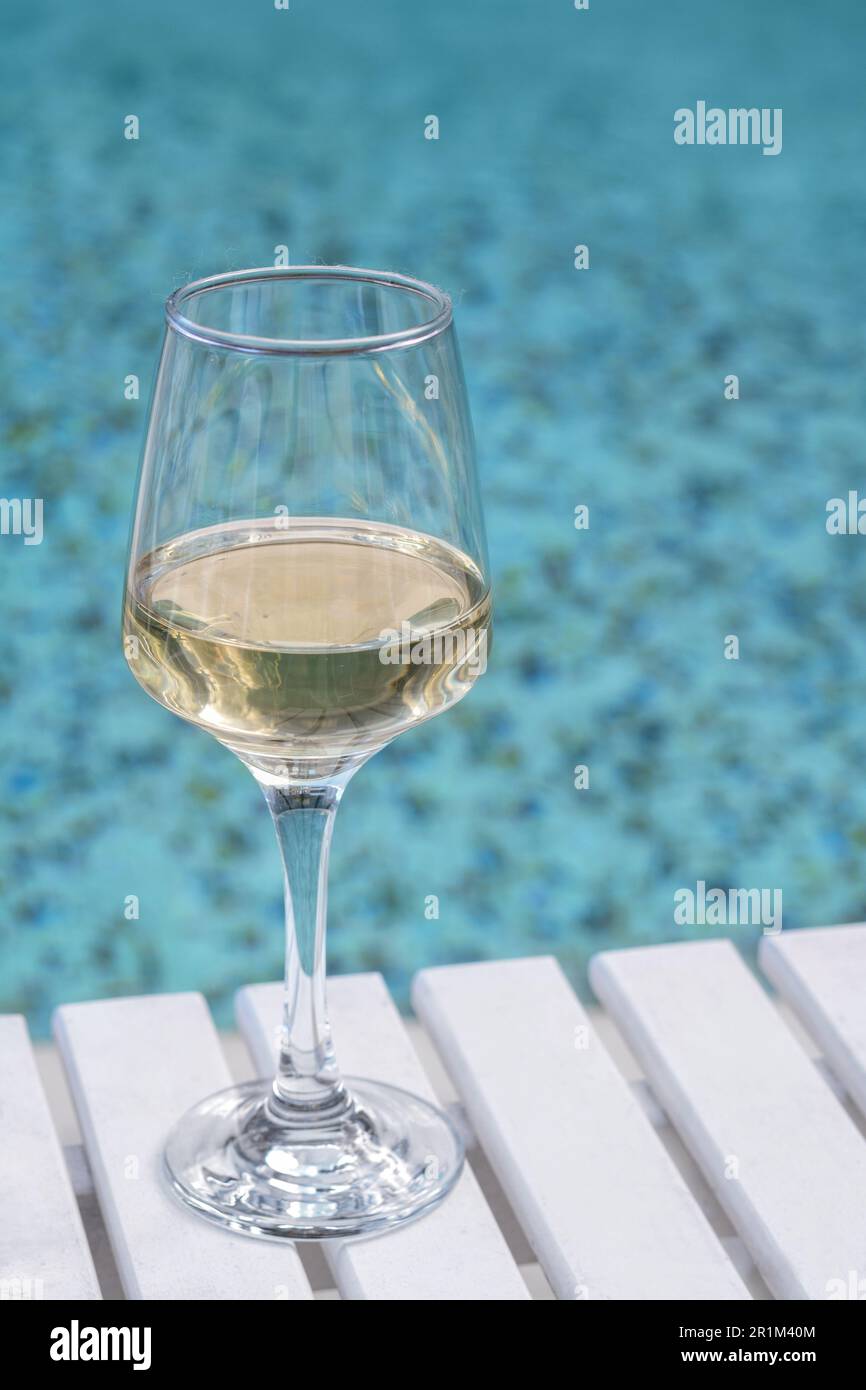 Sunny poolside table hi-res stock photography and images - Alamy