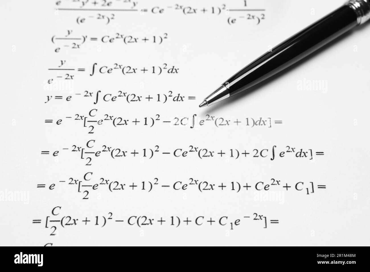 Sheet of paper with mathematical formulas and pen, closeup Stock Photo ...