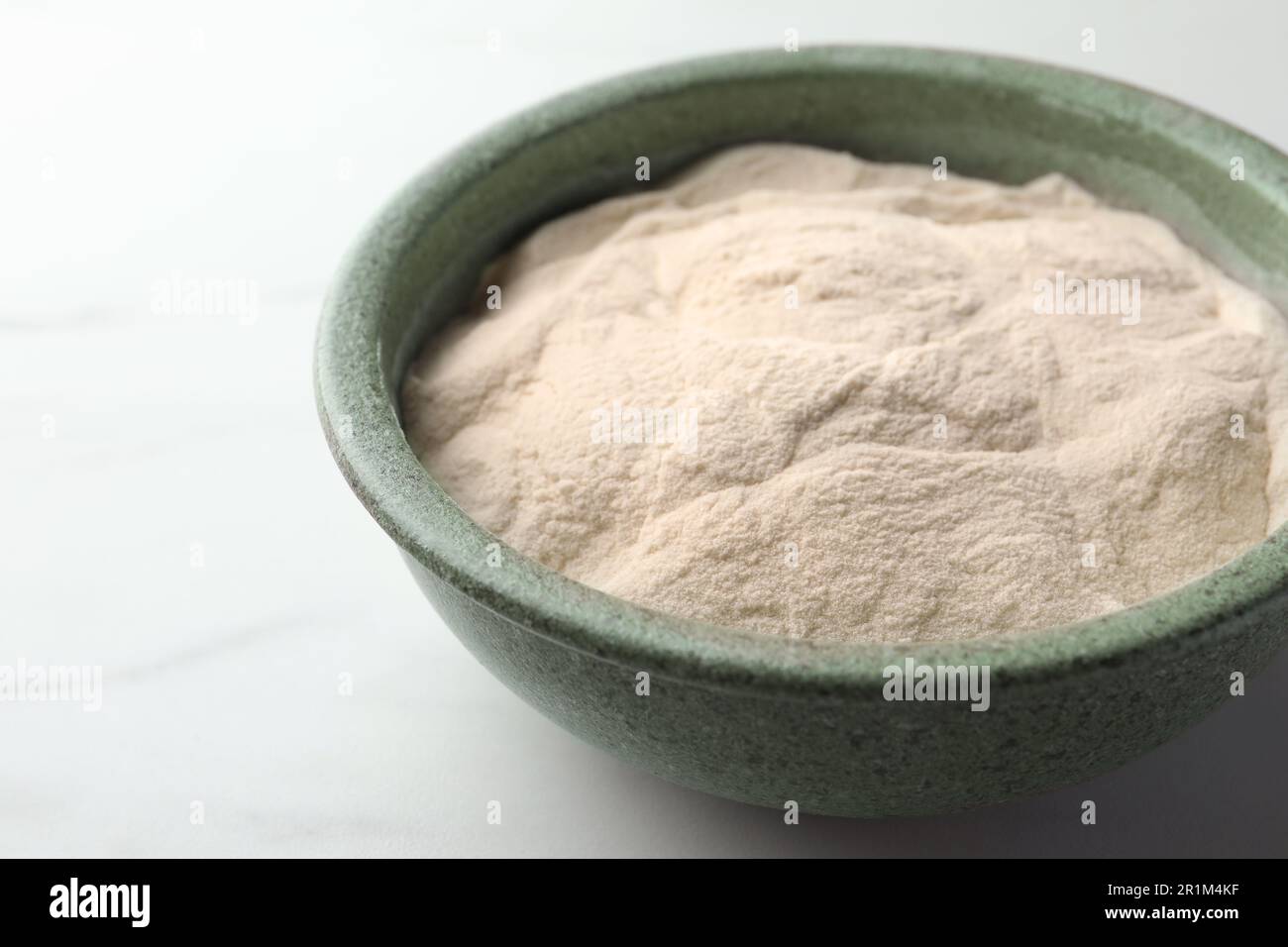 Bowl of agar-agar powder on white table, closeup Stock Photo - Alamy