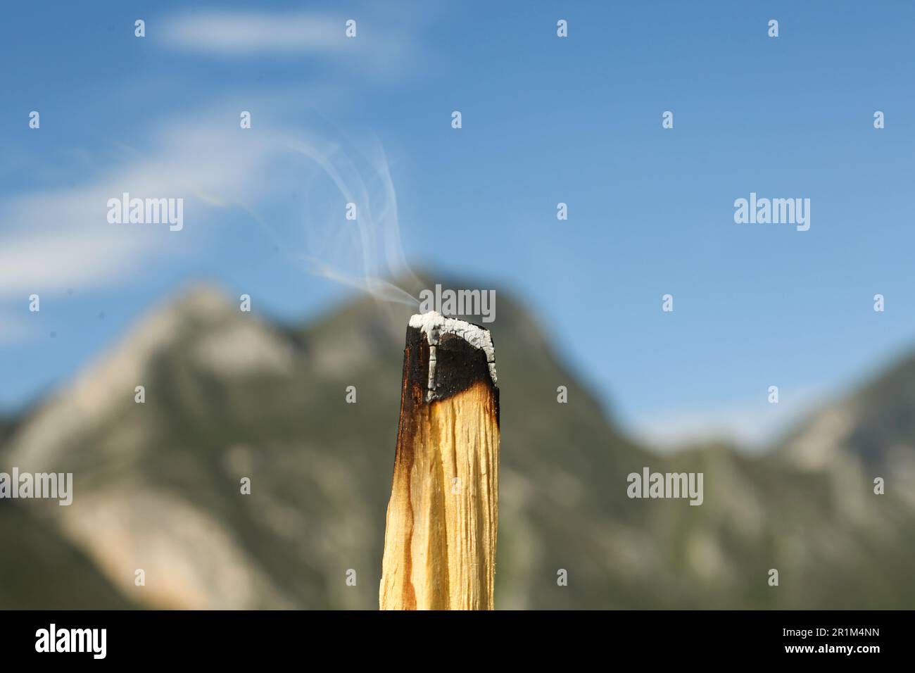 Burning palo santo stick in high mountains, closeup Stock Photo - Alamy