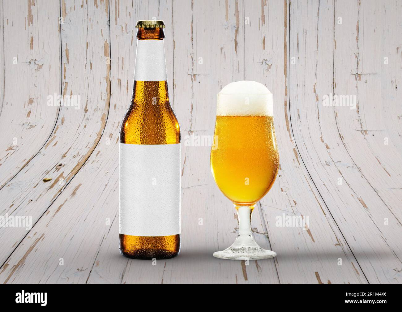 Front view Beer Bottle Mock-Up with glass of session pale ale and foam ...