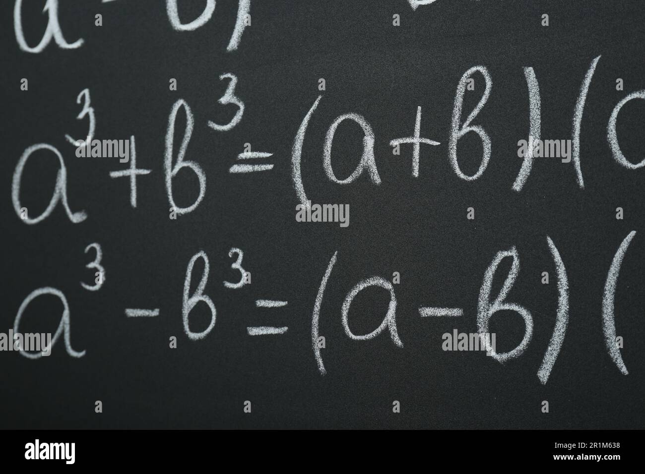 Many different math formulas written on chalkboard, closeup Stock Photo ...