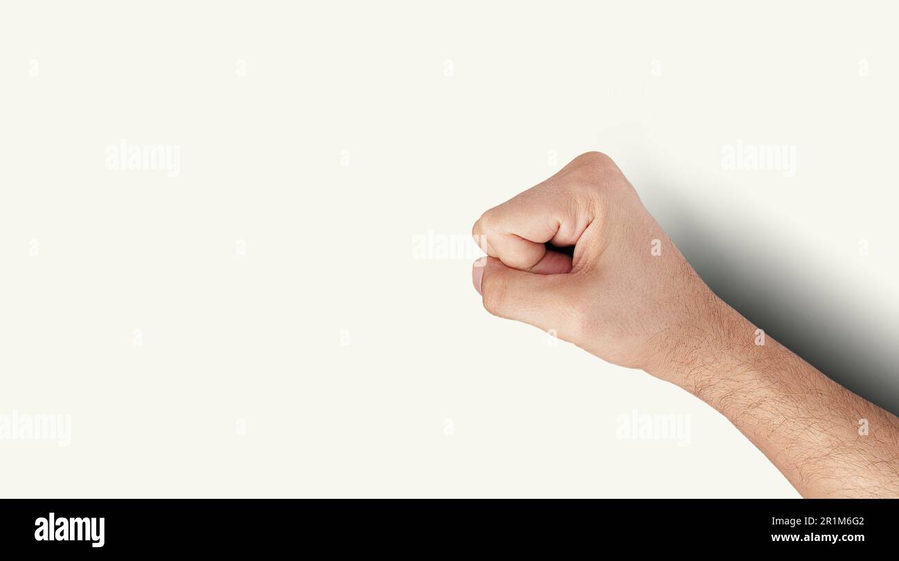 Top up view man fist on white background. added copy space for text ...