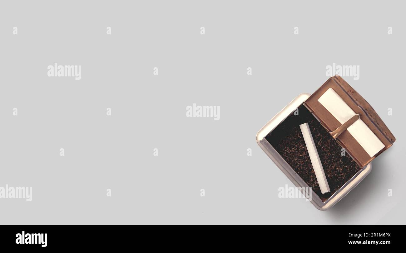 Raw tobacco in a box against white background.top up view Stock Photo ...