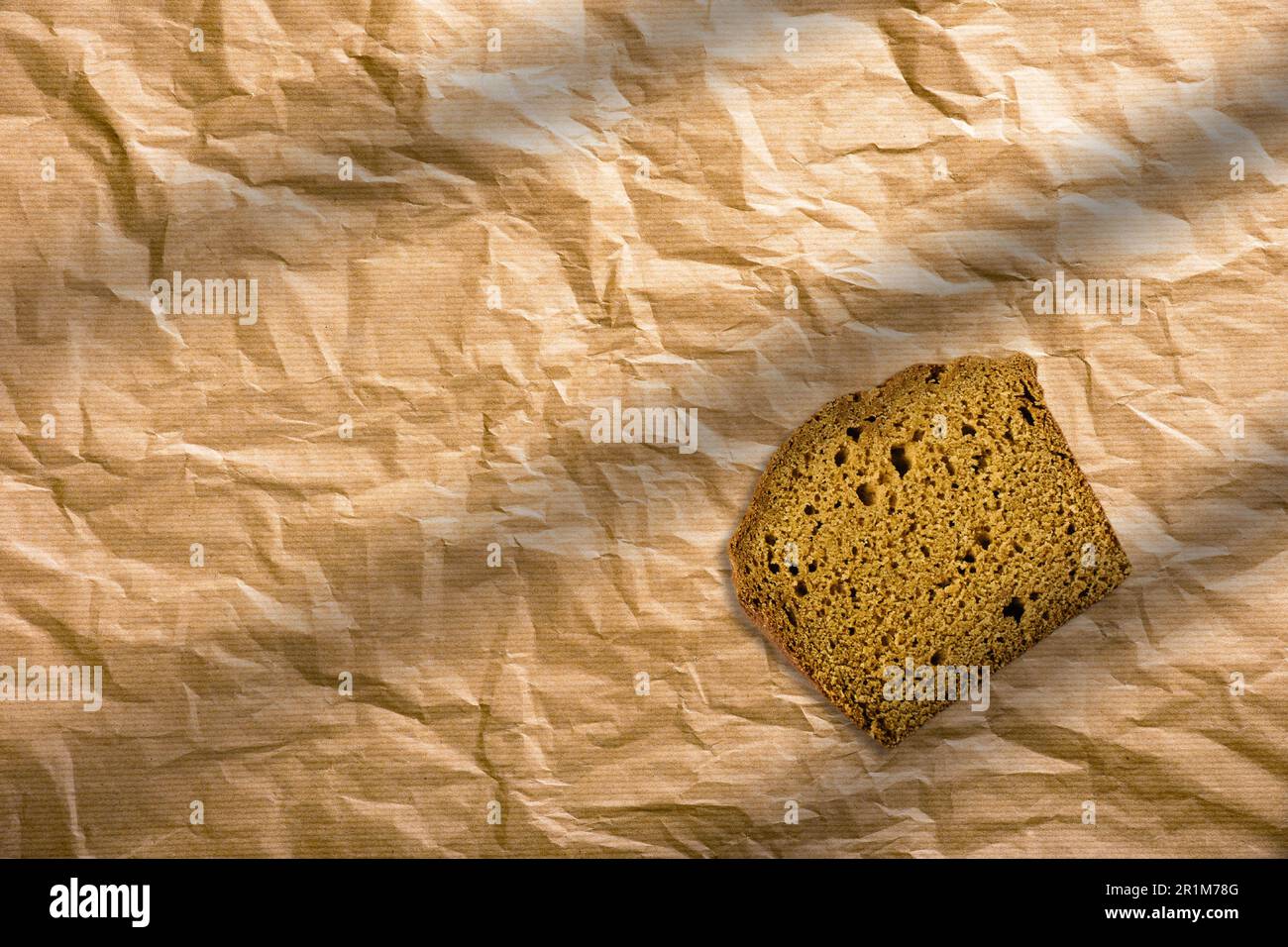 Sliced rye bread on an isolated brown background. Slices of brown bread ...