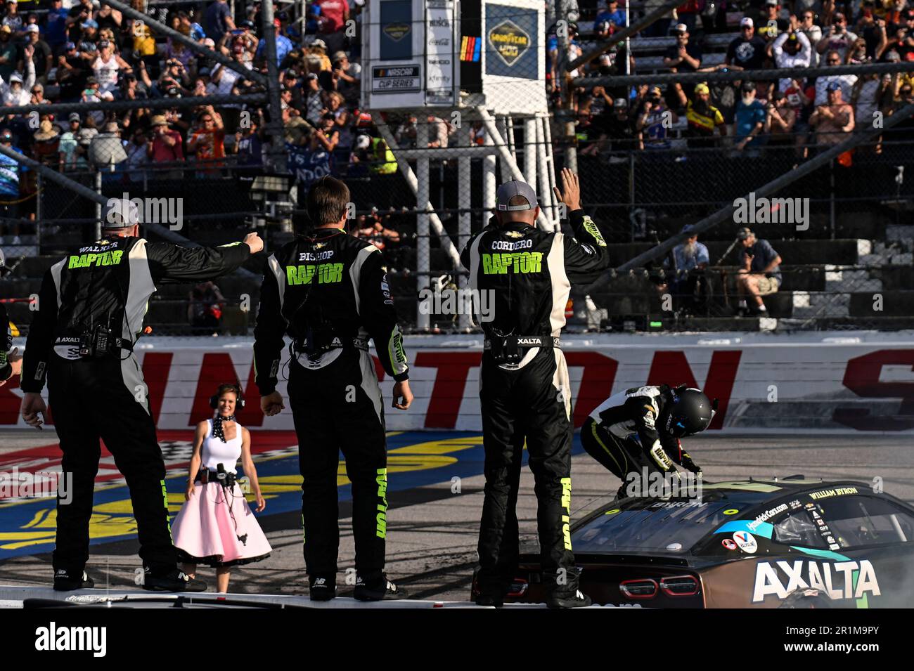 William Byron, right, climbs out of his car as his pit crew celebrates ...