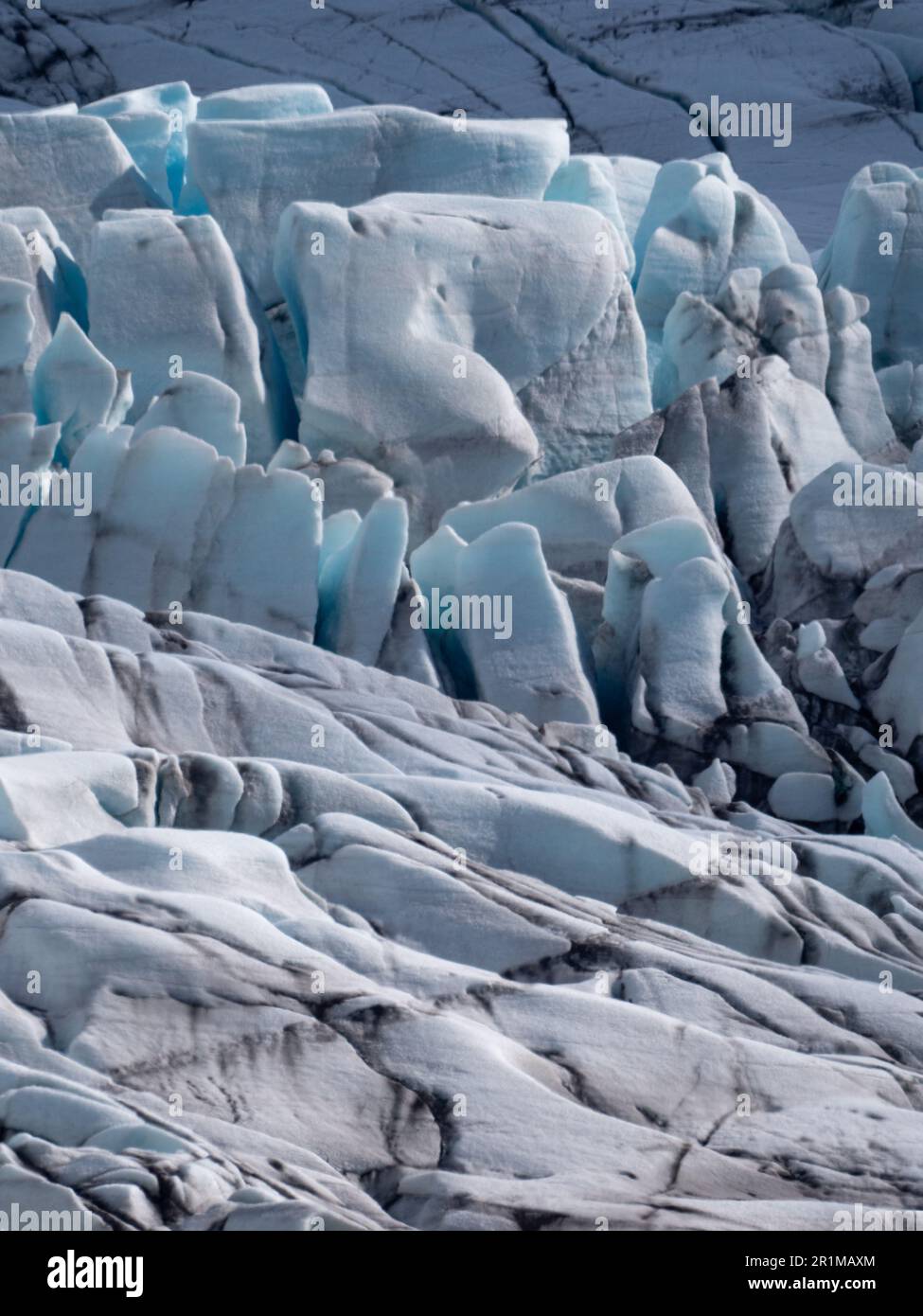 A breathtaking landscape featuring snow-capped mountains and a glacier ...