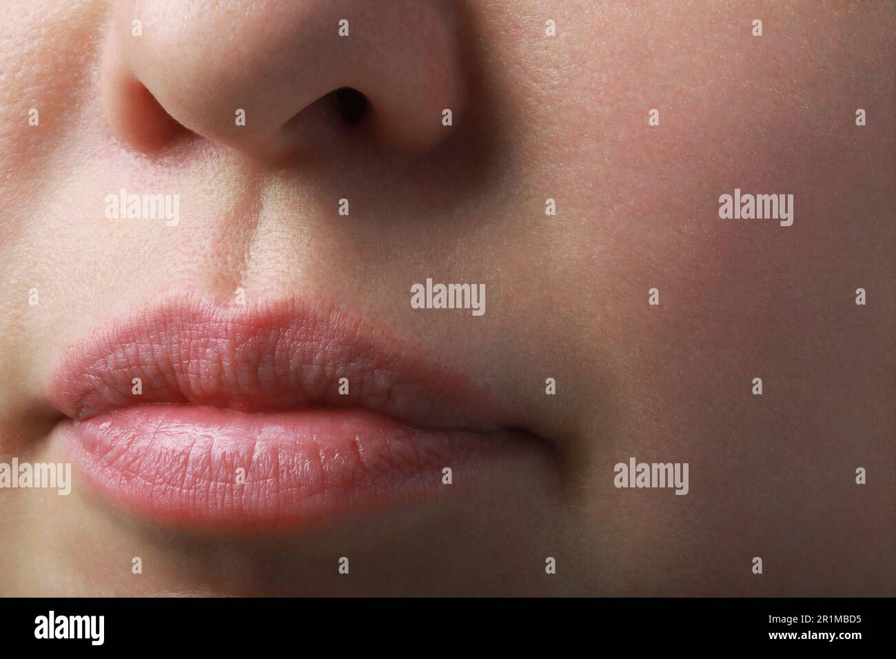 Moisturizing lips hi-res stock photography and images - Alamy