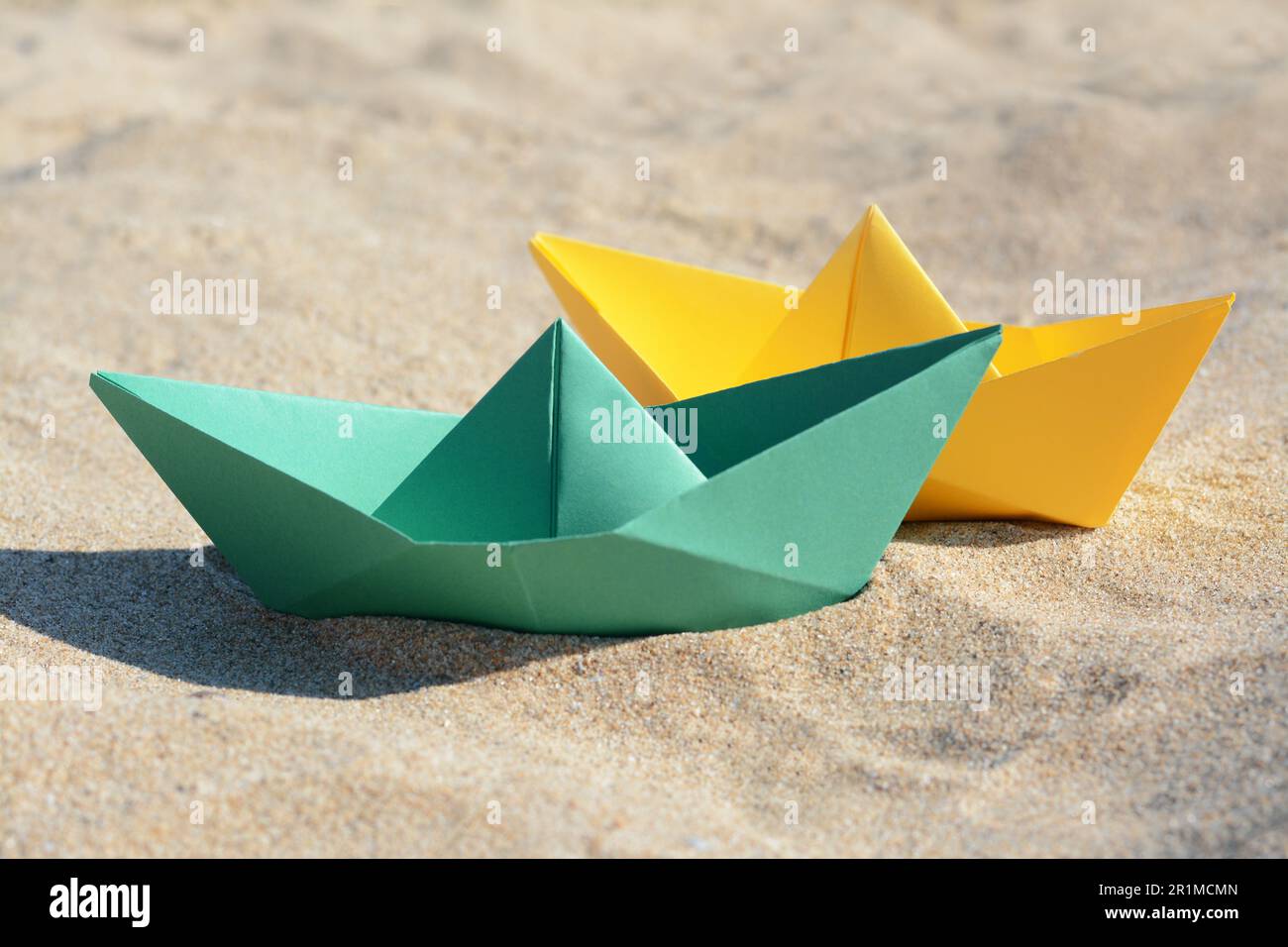 Two paper boats beach hi-res stock photography and images - Alamy