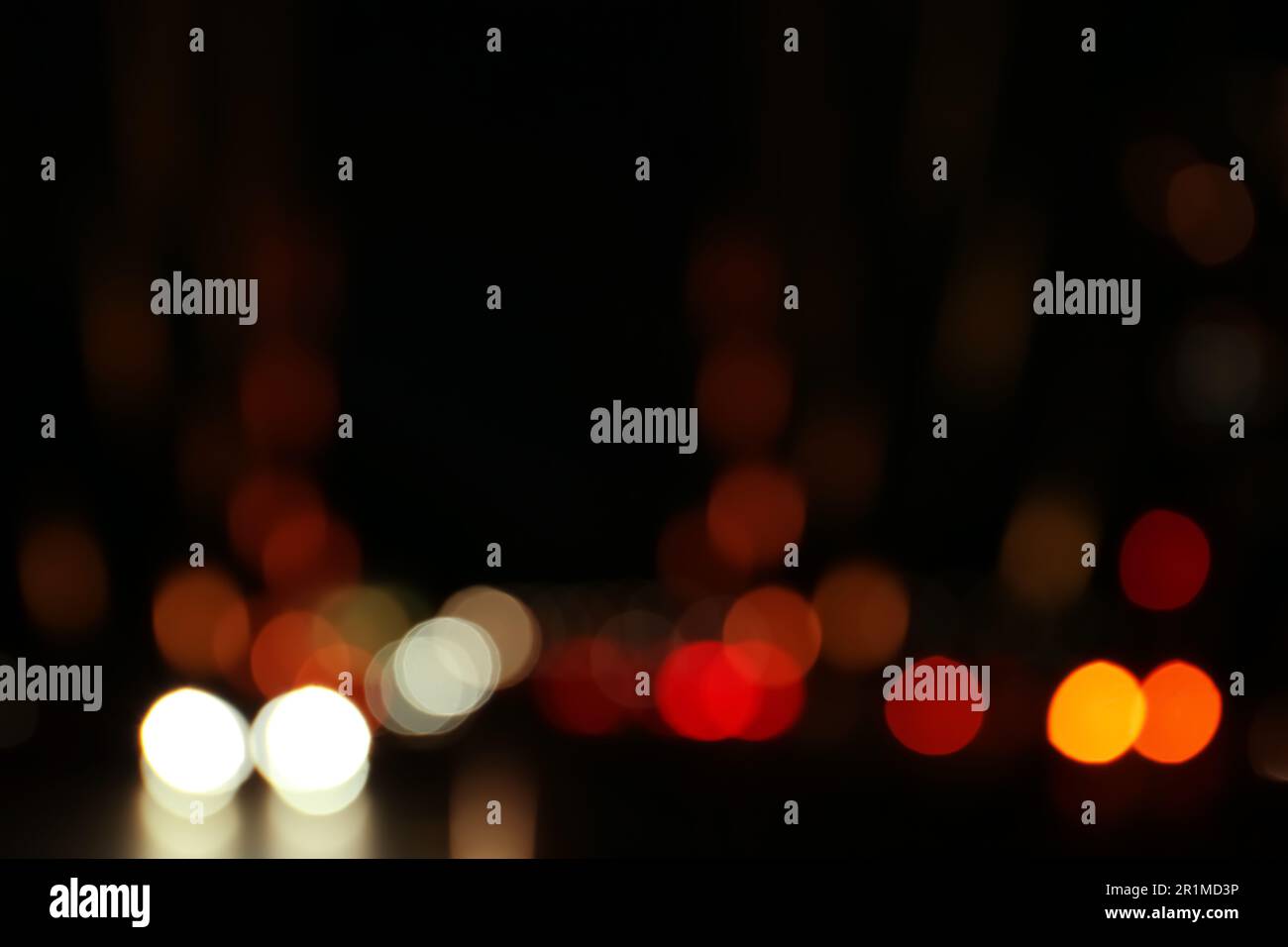 Blurred view of city lights at night. Bokeh effect Stock Photo - Alamy