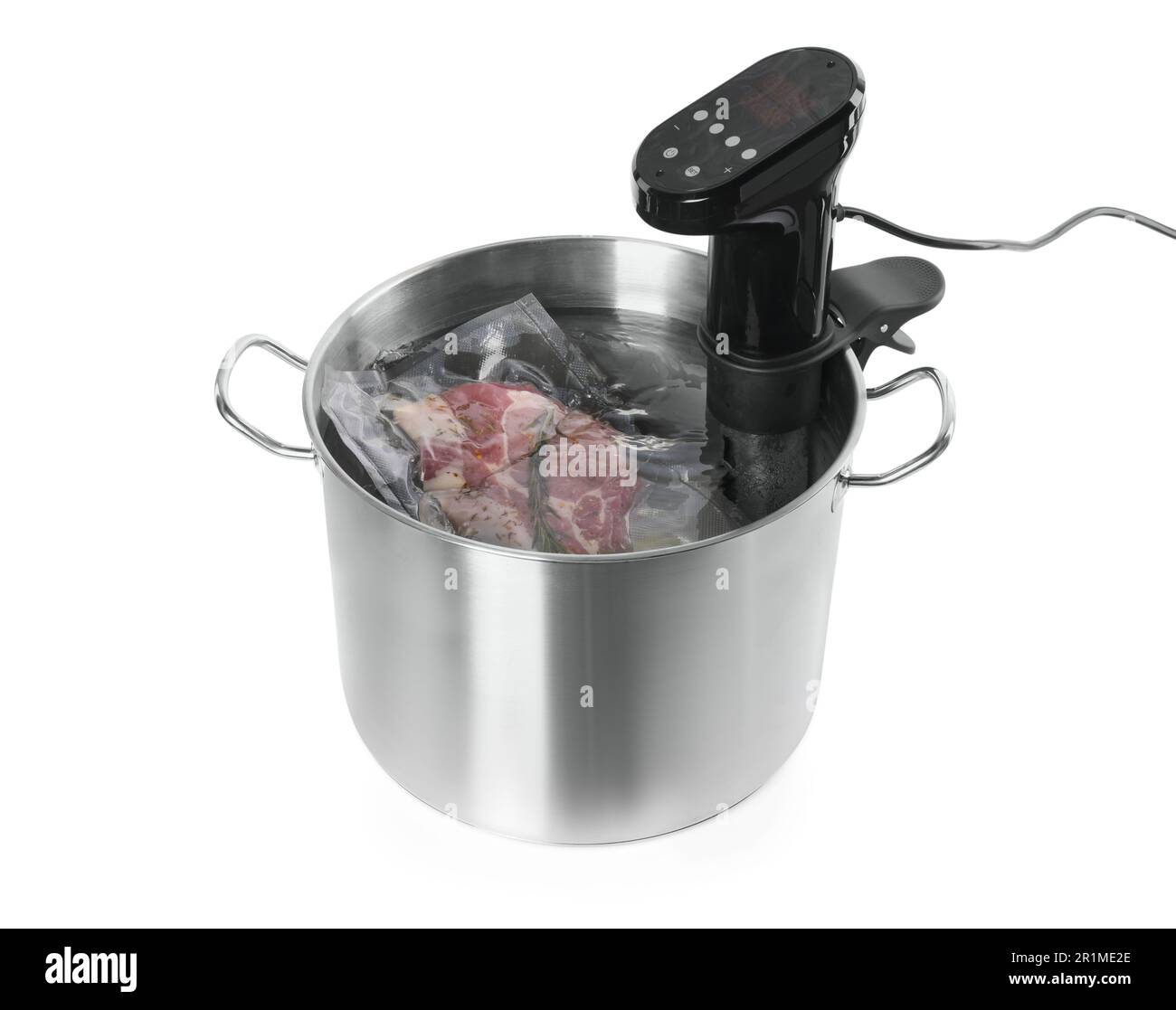 Thermal immersion circulator and vacuum packed meat in pot on white ...
