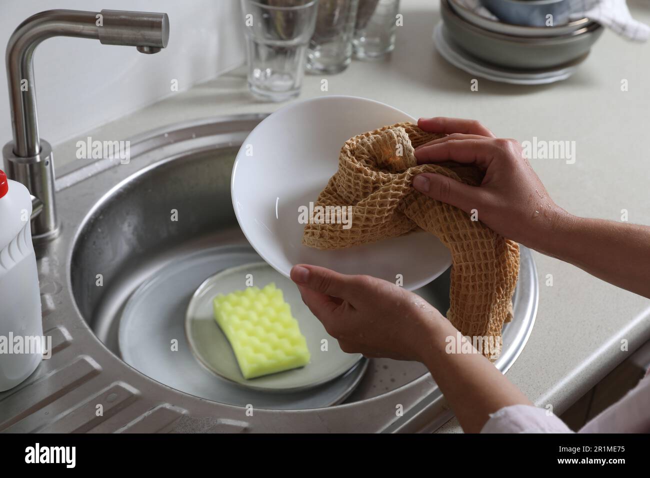 Wiping plate hi-res stock photography and images - Alamy