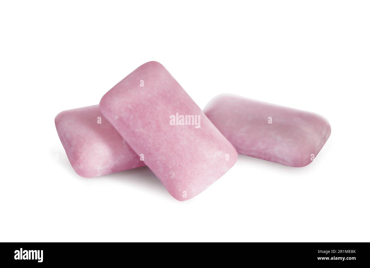 Tasty sweet chewing gums on white background Stock Photo - Alamy