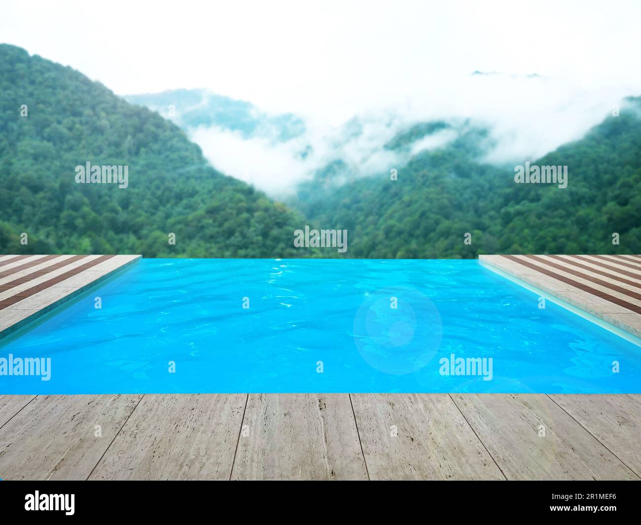 Outdoor swimming pool at luxury resort with beautiful view of mountains ...