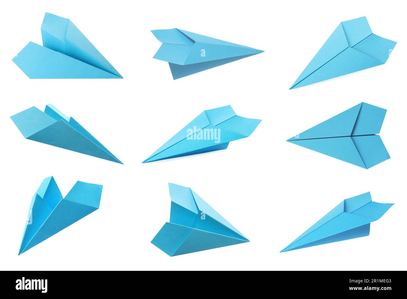 Set with handmade light blue paper planes on white background Stock ...