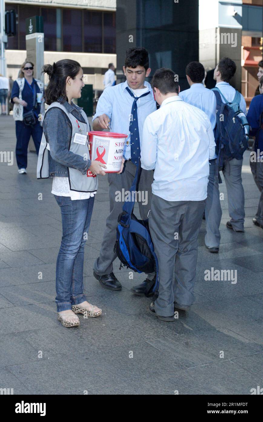 A collector seeks public donations for the Aids Trust of Australia on ...