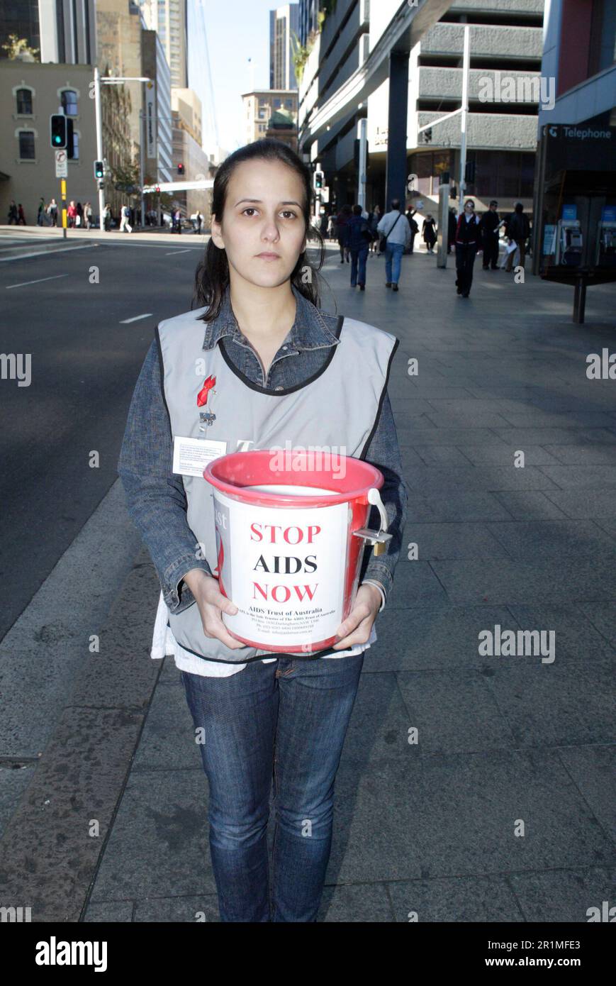 A collector seeks public donations for the Aids Trust of Australia on ...
